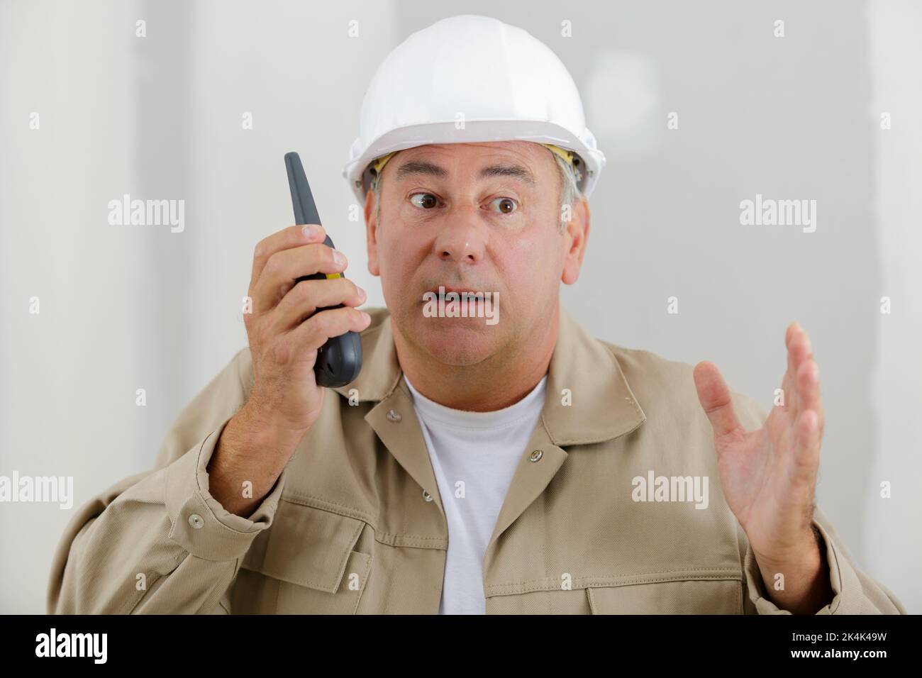 Engineer builder using walkie talkie hi-res stock photography and ...