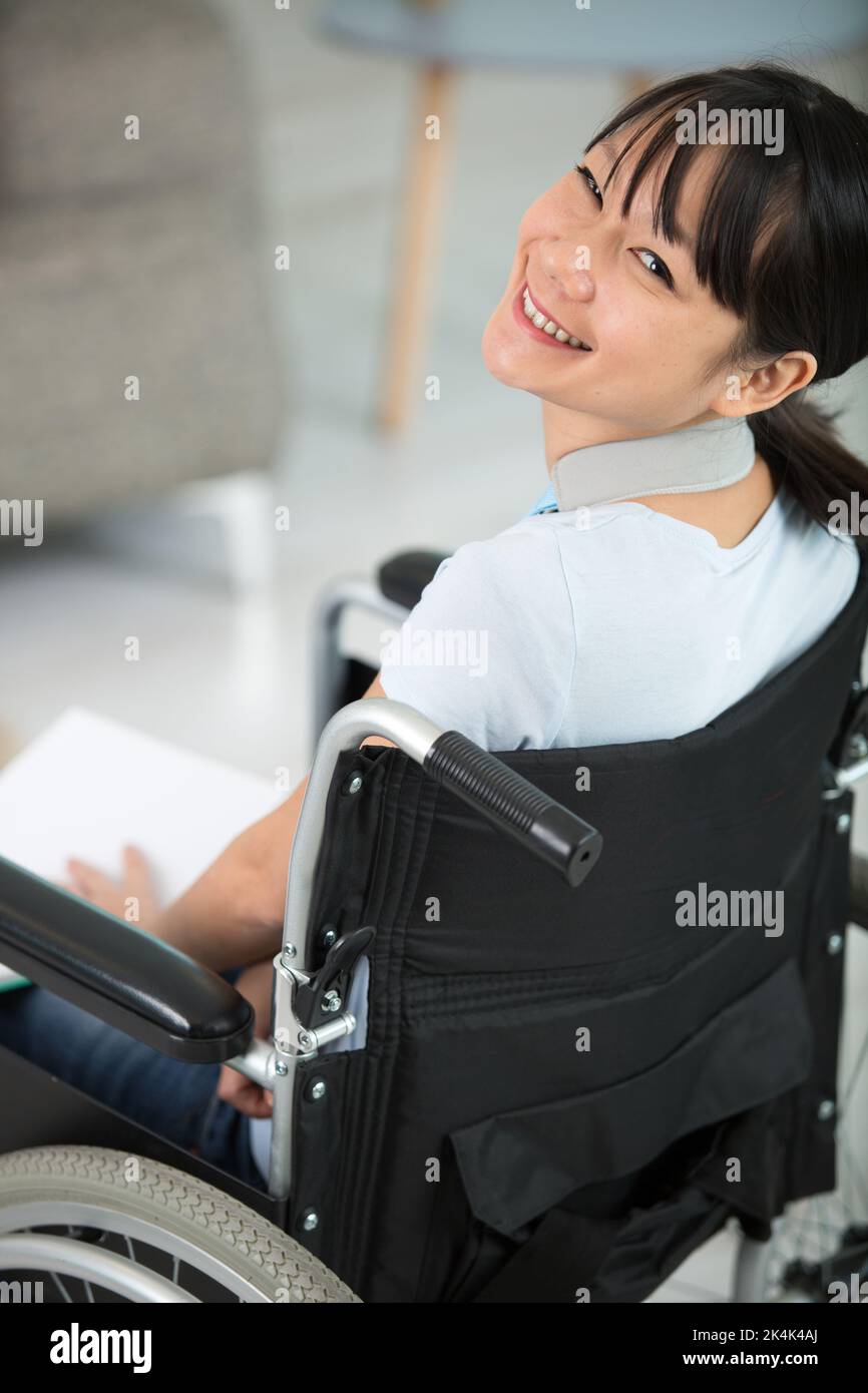 happy disabled woman smiling at the camera Stock Photo - Alamy