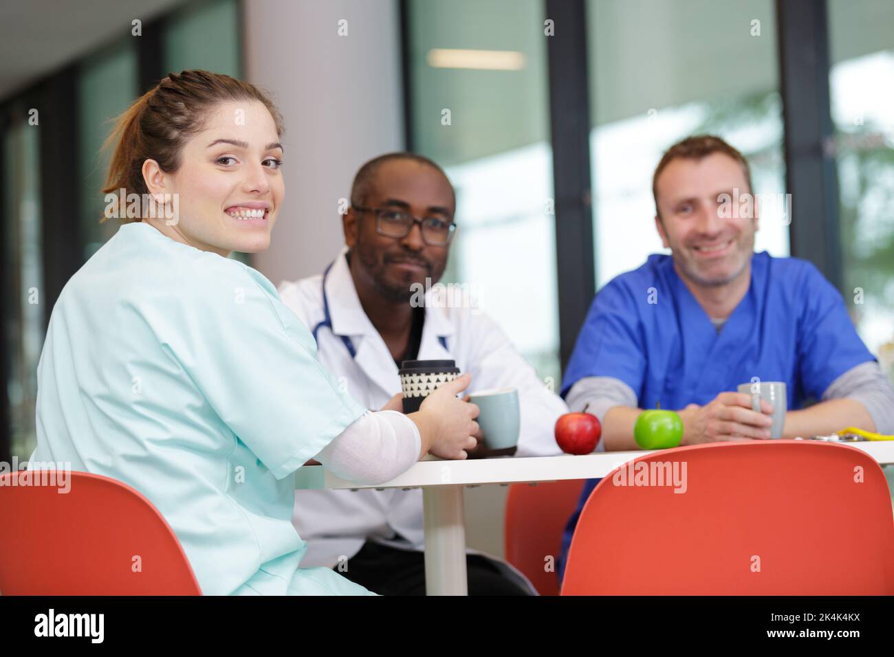 group of doctors in the cafeteria Stock Photo - Alamy