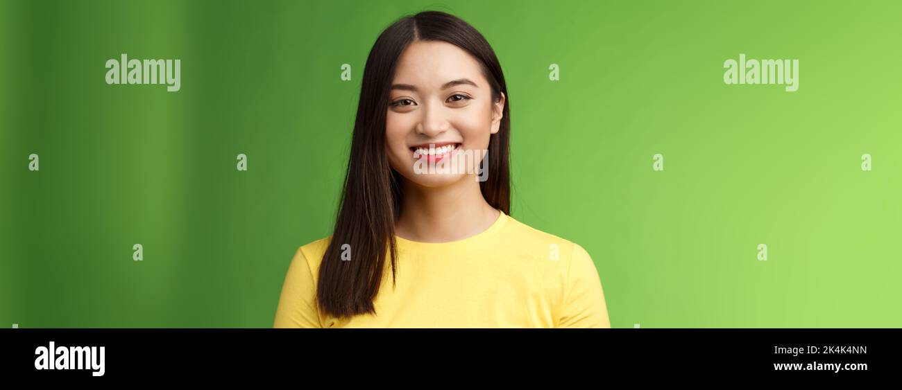 Optimistic cute carefree asian girl taking care skin condition, smiling ...