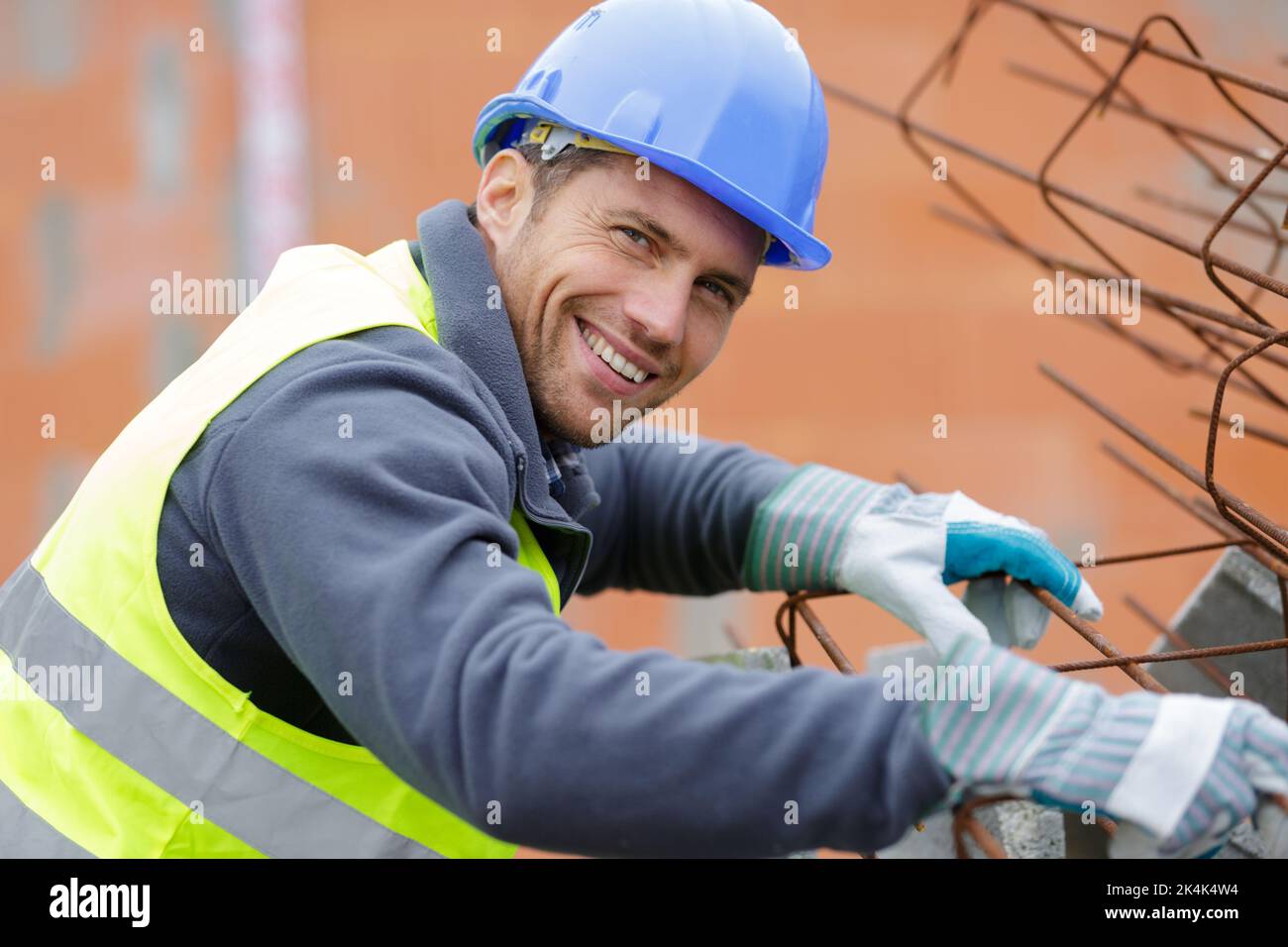 building structure and working man under construction Stock Photo - Alamy