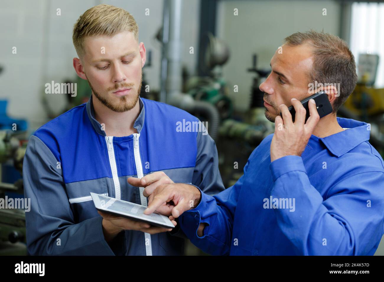 Two young handy men hi-res stock photography and images - Alamy