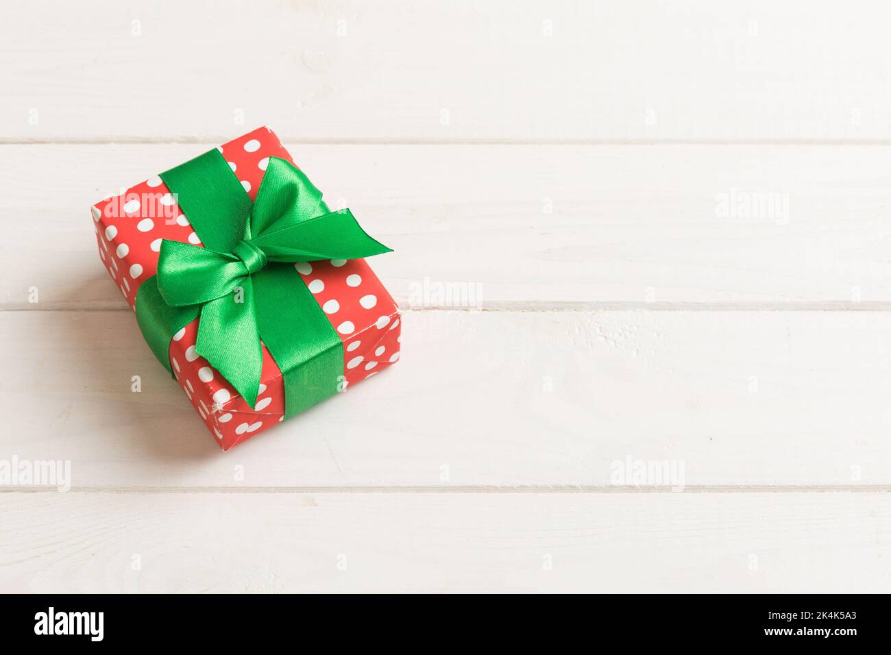 Wrapped christmas or other holiday handmade present in paper with ...