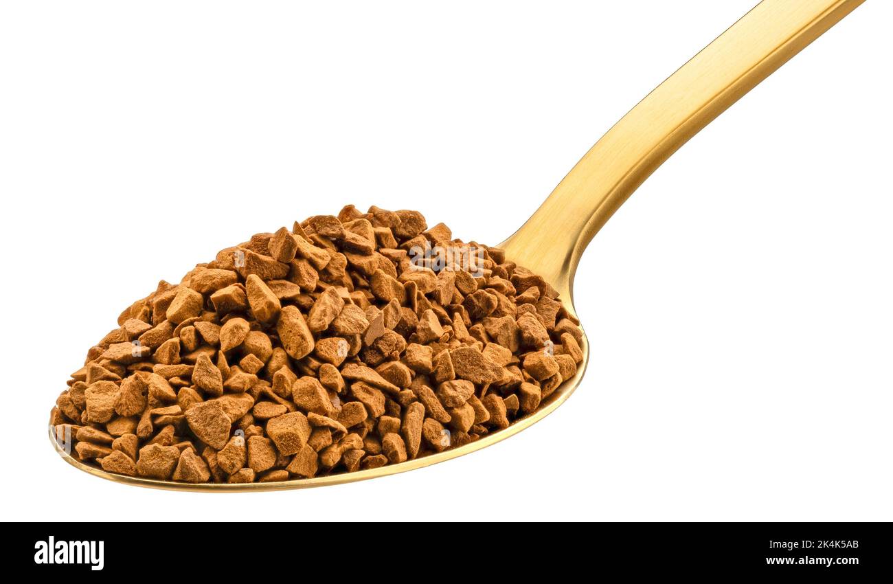 Instant coffee in gold spoon isolated on white background Stock Photo ...