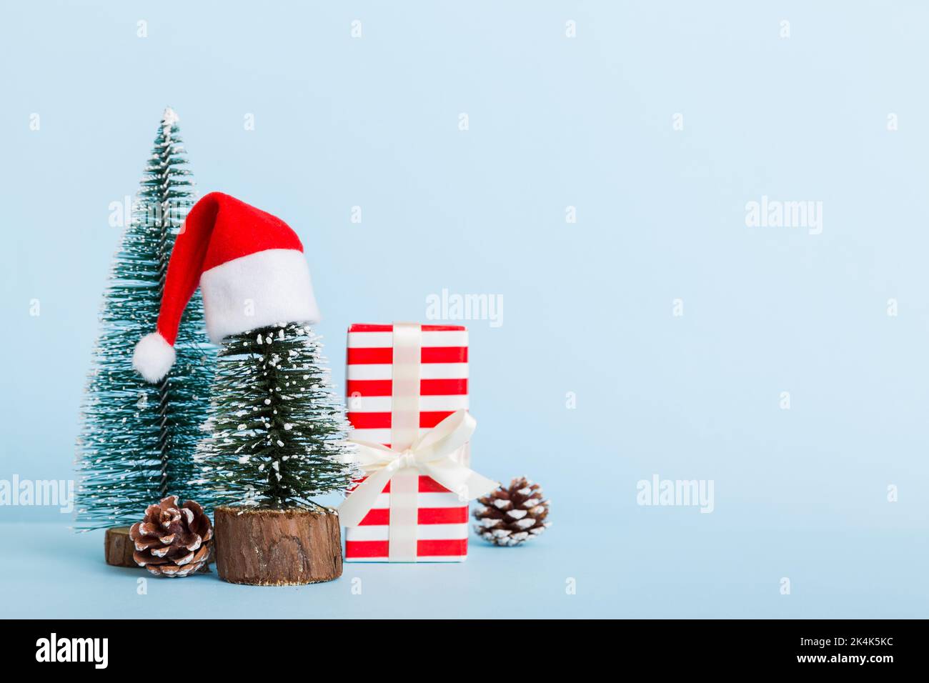 Christmas composition. craft Gift box, small tree, branches and craft ...