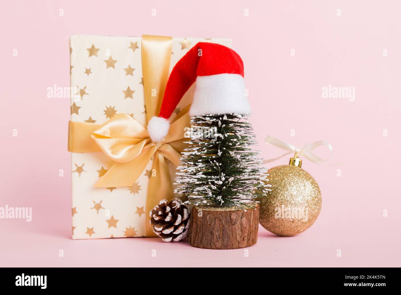 Christmas composition. craft Gift box, small tree, branches and craft ...