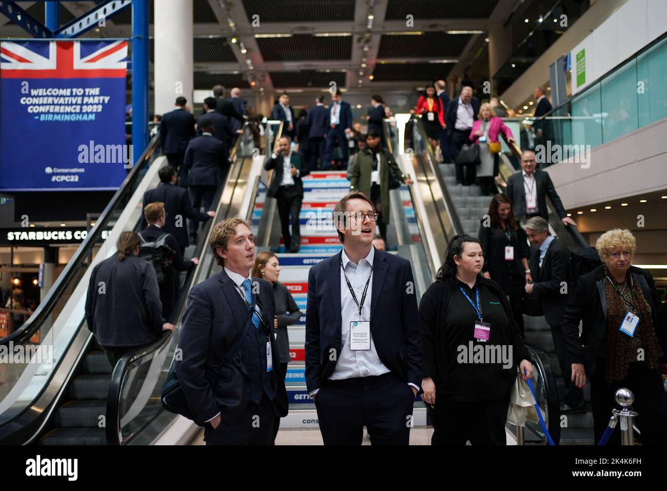 Delegates walk through the conference hall during the Conservative ...