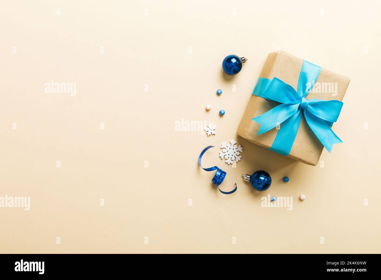 Top view Flat lay Christmas decorations and gift box on colored ...