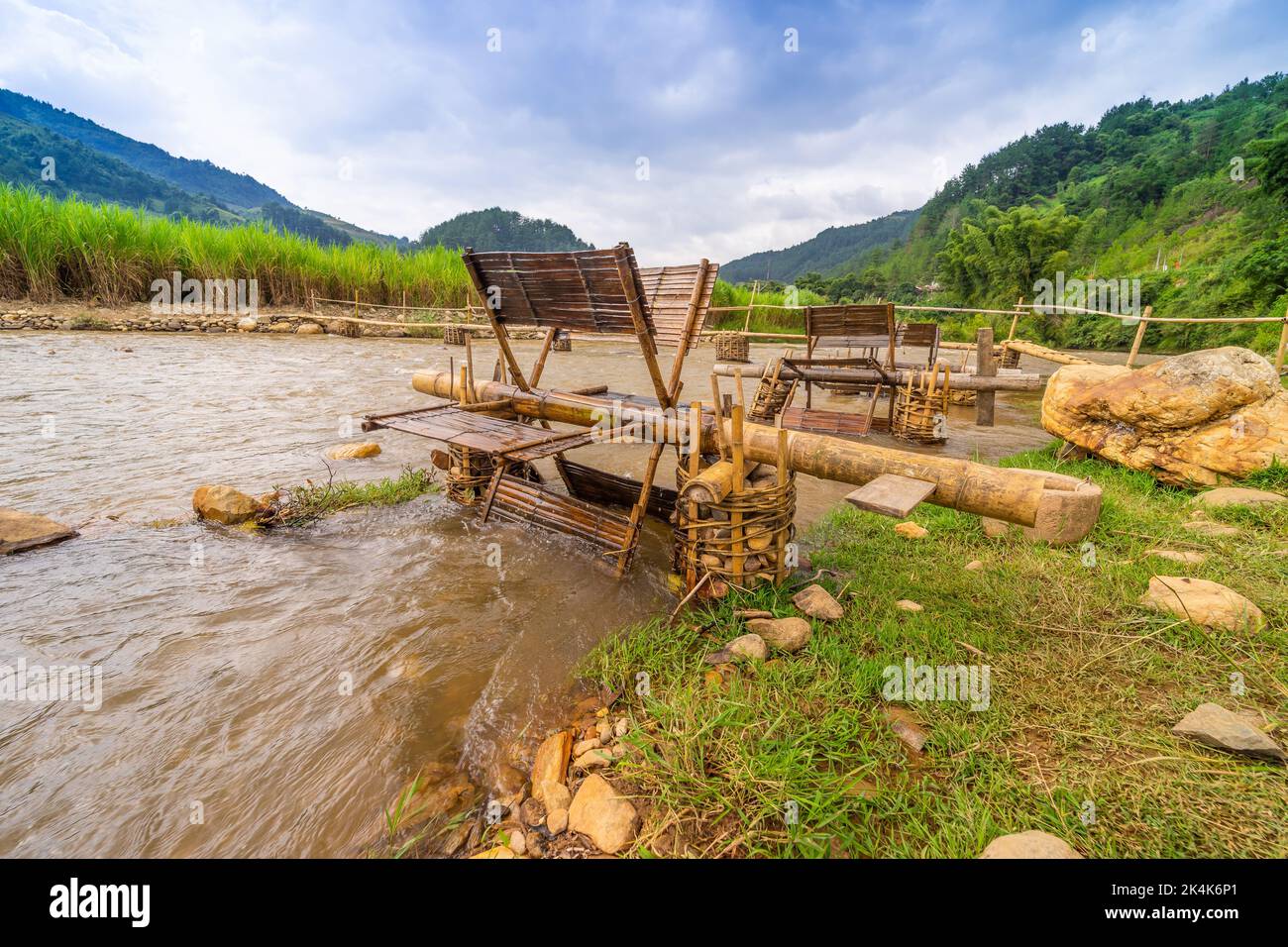 view of Water mill in Mu Cang Chai, Yen Bai province, Vietnam in a ...