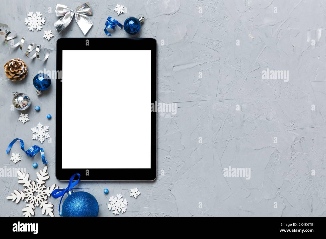 Digital tablet mock up with rustic Christmas decorations for app ...