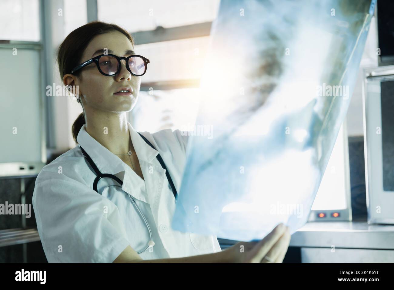 Female doctor check on scan results on monitors in laboratory Stock ...