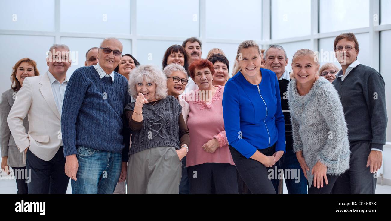 group of happy seniors look at camera Stock Photo - Alamy