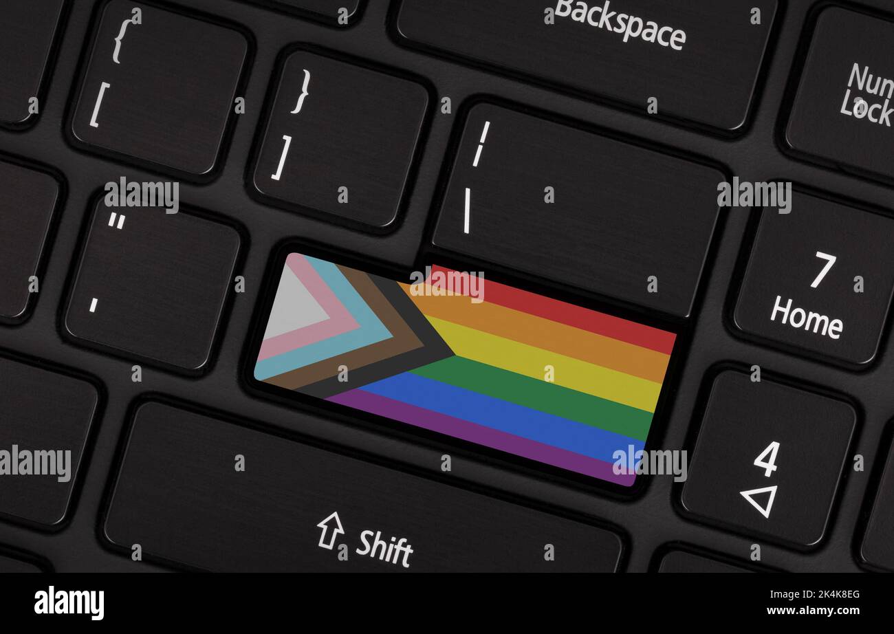 Progress LGBTQ Rainbow flag on a black keyboard - Enter key Stock Photo ...