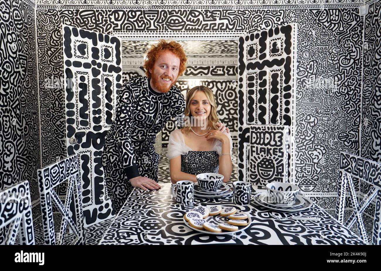 British artist Sam Cox, aka Mr Doodle, with his wife Alena, reveals the ...