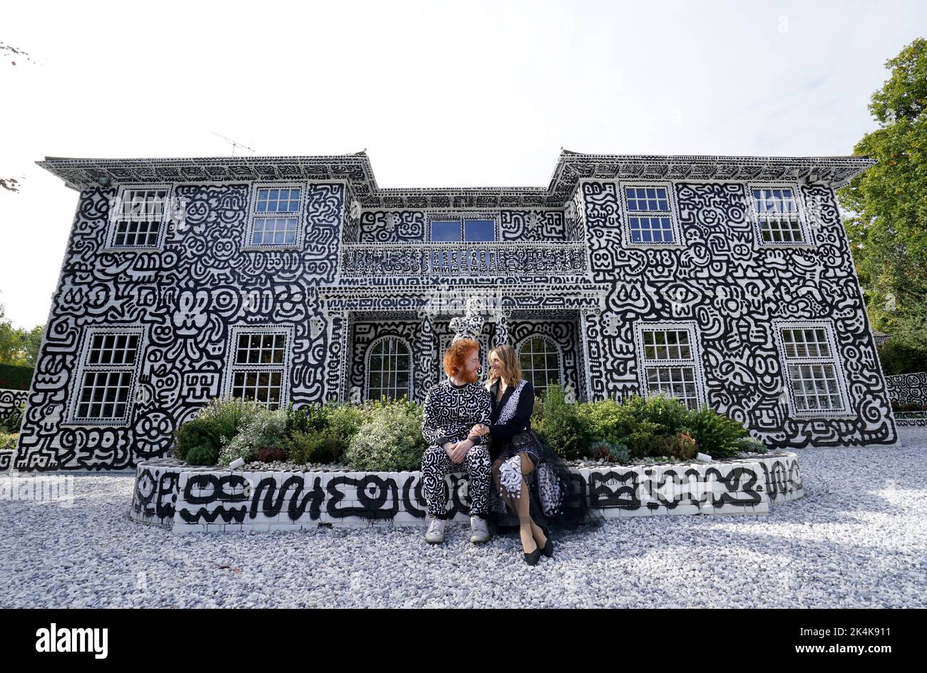 British artist Sam Cox, aka Mr Doodle, with his wife Alena, reveals the ...