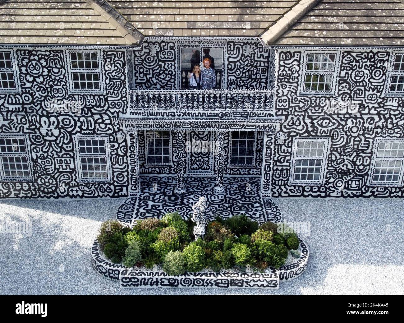 British artist Sam Cox, aka Mr Doodle, with his wife Alena, reveals the ...