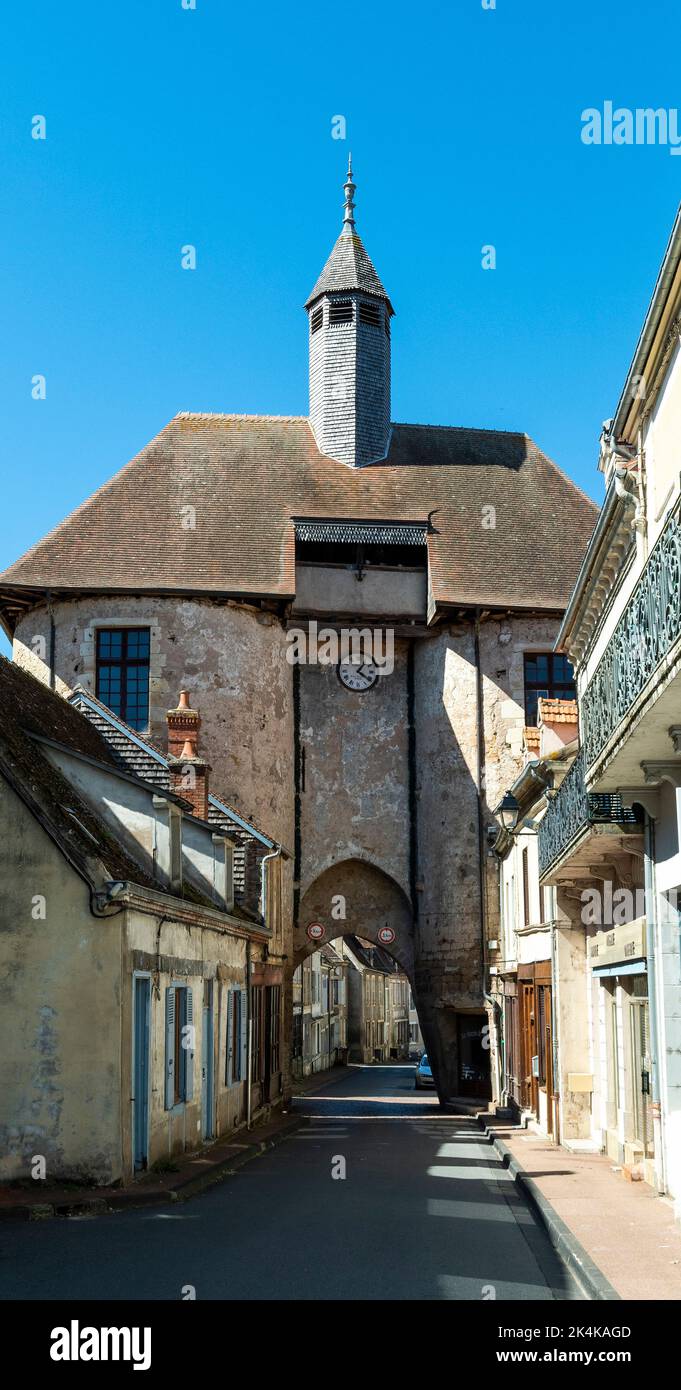 Land of Troncais, Ainay le Chateau. The clock gate. Allier department ...