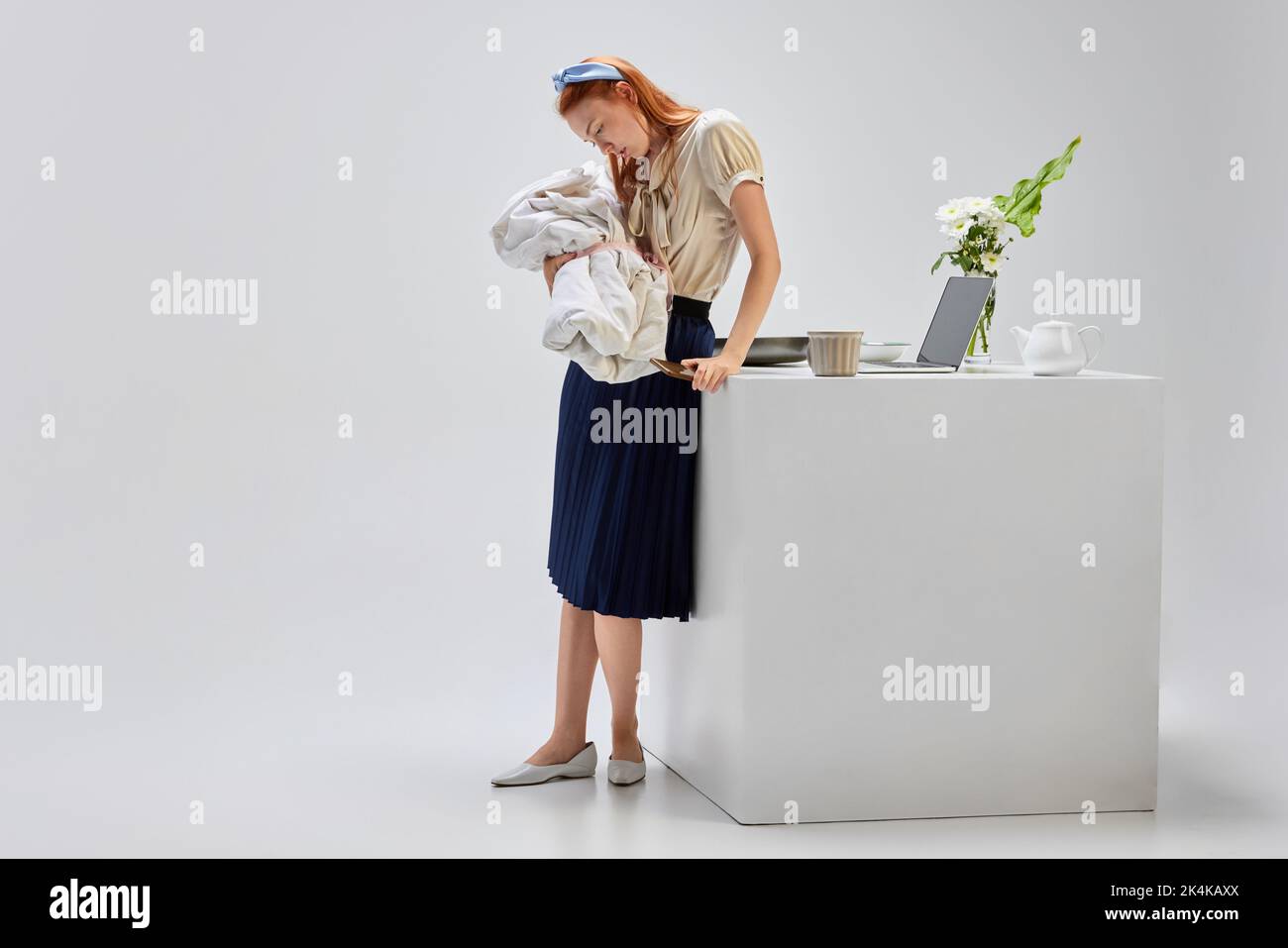 Lifestyle of modern women. Business and housekeeping. Tired young woman ... Lifestyle of modern women. Business and housekeeping. Tired young woman ...