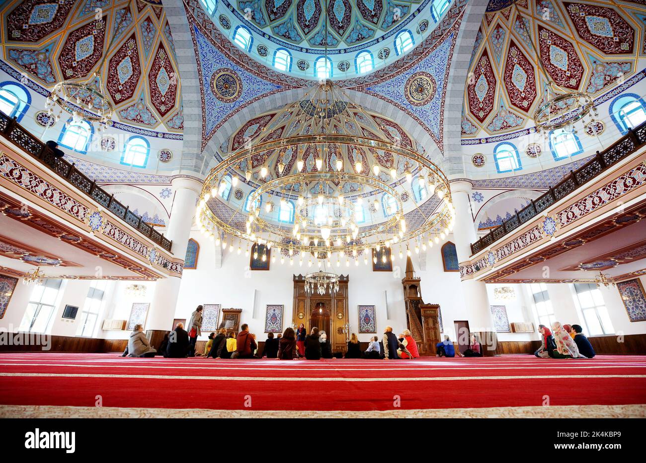 Duisburg, Germany. 03rd Oct, 2022. Visitors to the Merkez Mosque take a ...