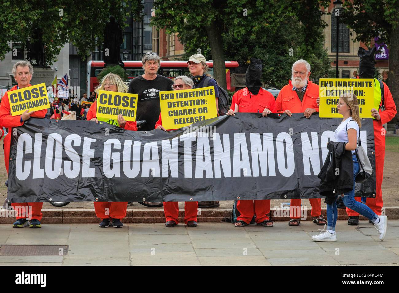 Protesters on Parliament Square with 'Close Guantanamo Now' banner and ...