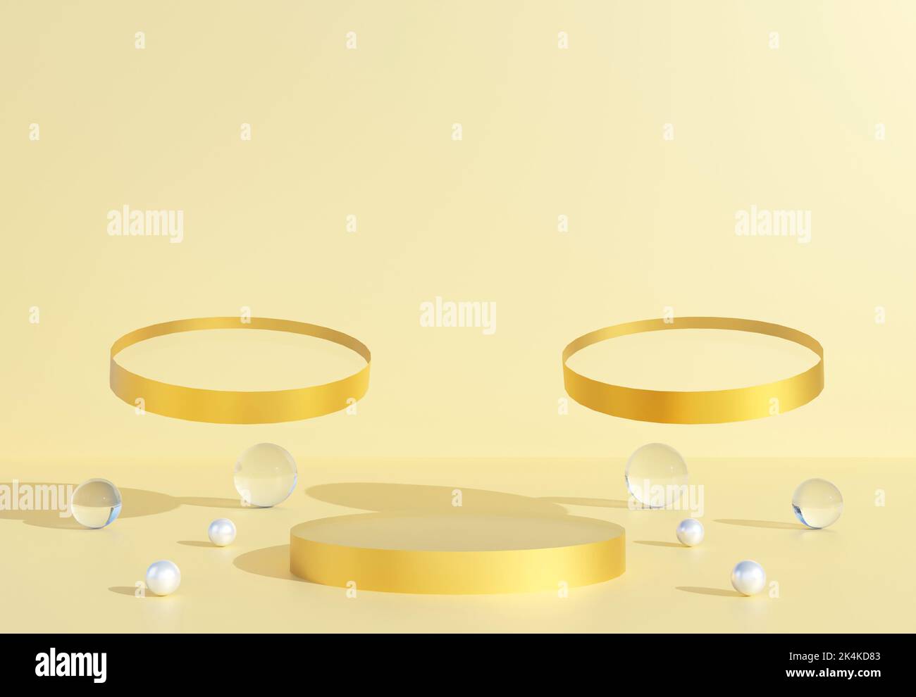 Transparent cylinder podium with decorative objects in yellow ...