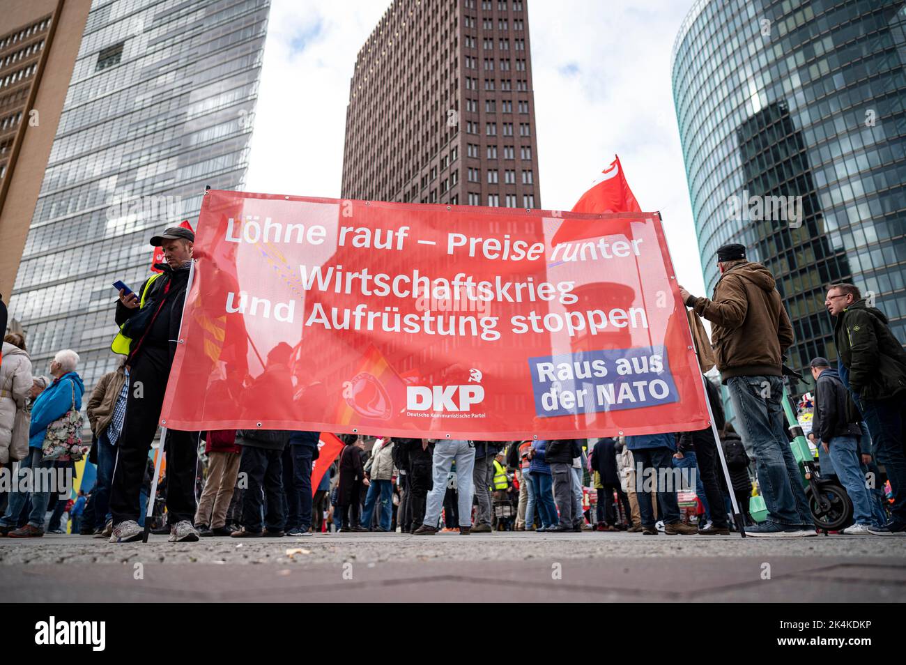 Berlin, Germany. 03rd Oct, 2022. Participants stand at the ...