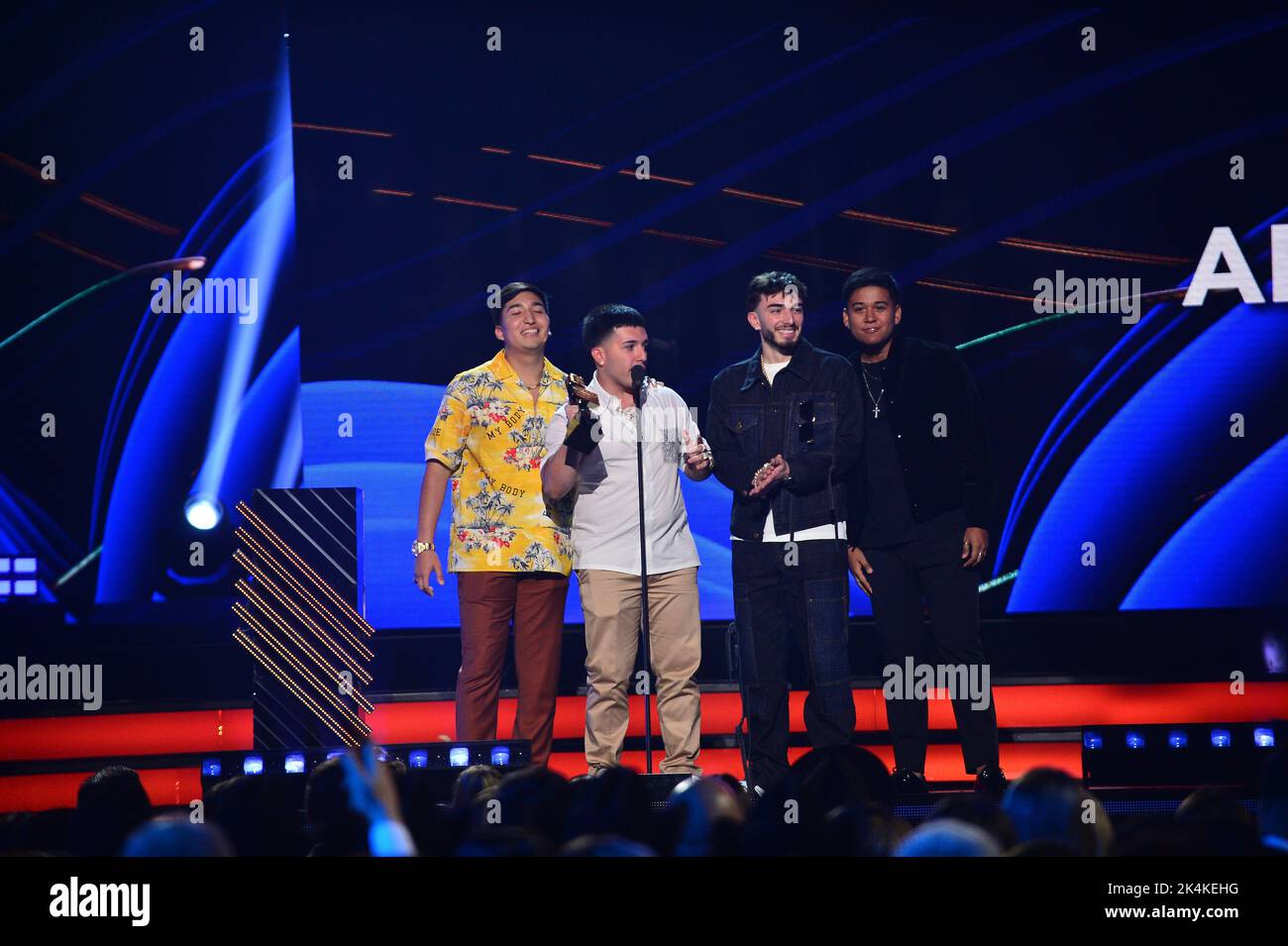 CORAL GABLES, FLORIDA - SEPTEMBER 29: Eslabon Armado accepts the Top ...
