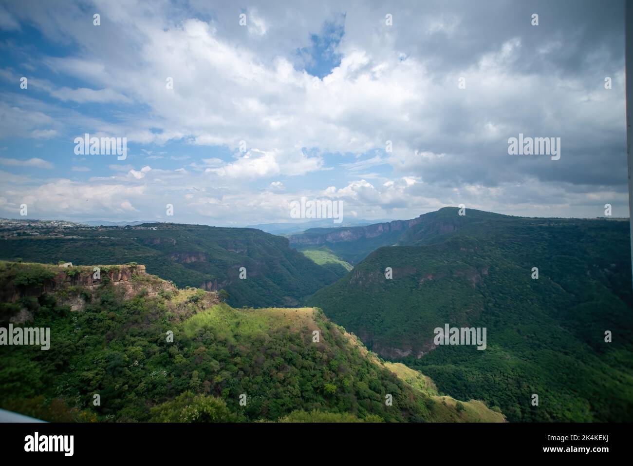 ravine trees and vegetation, view of several mountains at different ...