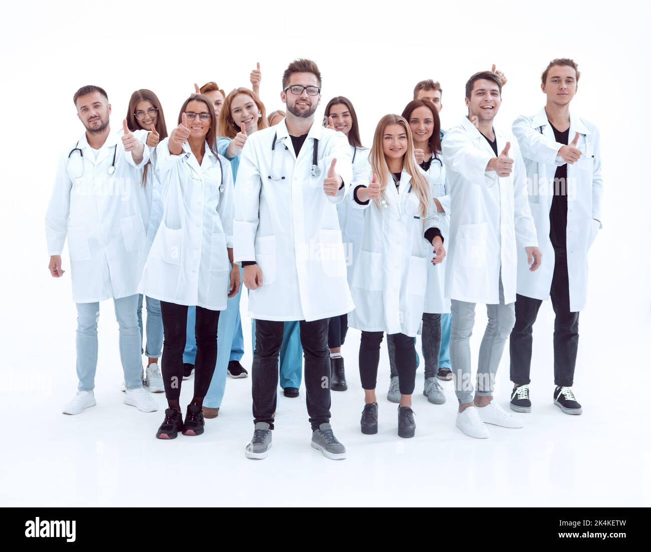 large group of diverse doctors giving a thumbs up Stock Photo - Alamy