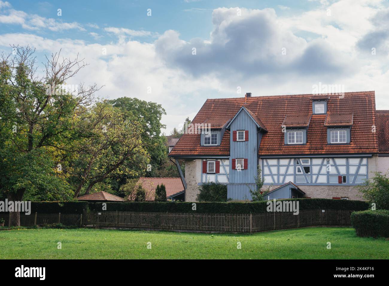 Traditional small house with beautiful outdoor decor facade in Germany ...