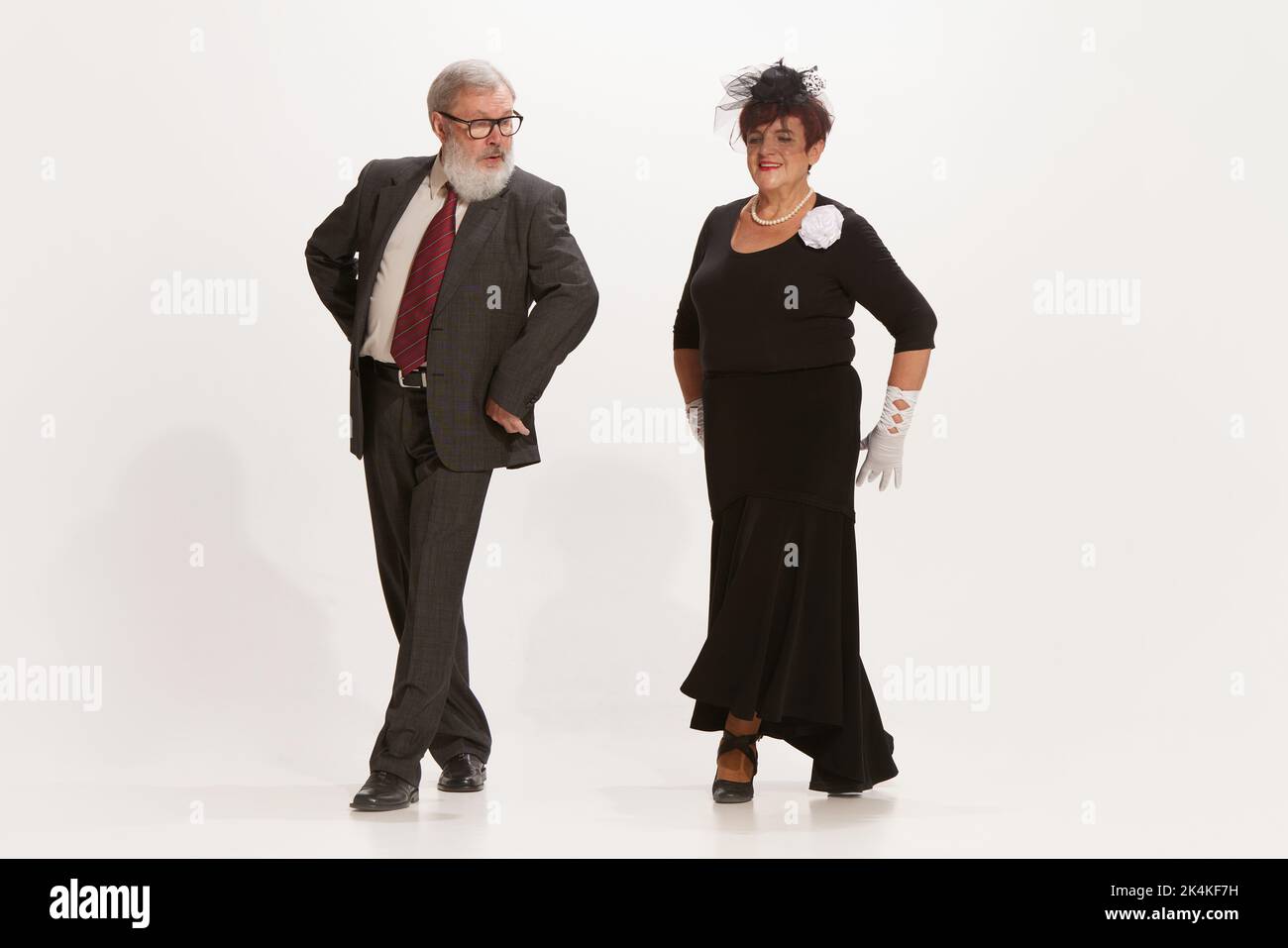 Social dances. Senior man and adorable middle age woman in vintage ...