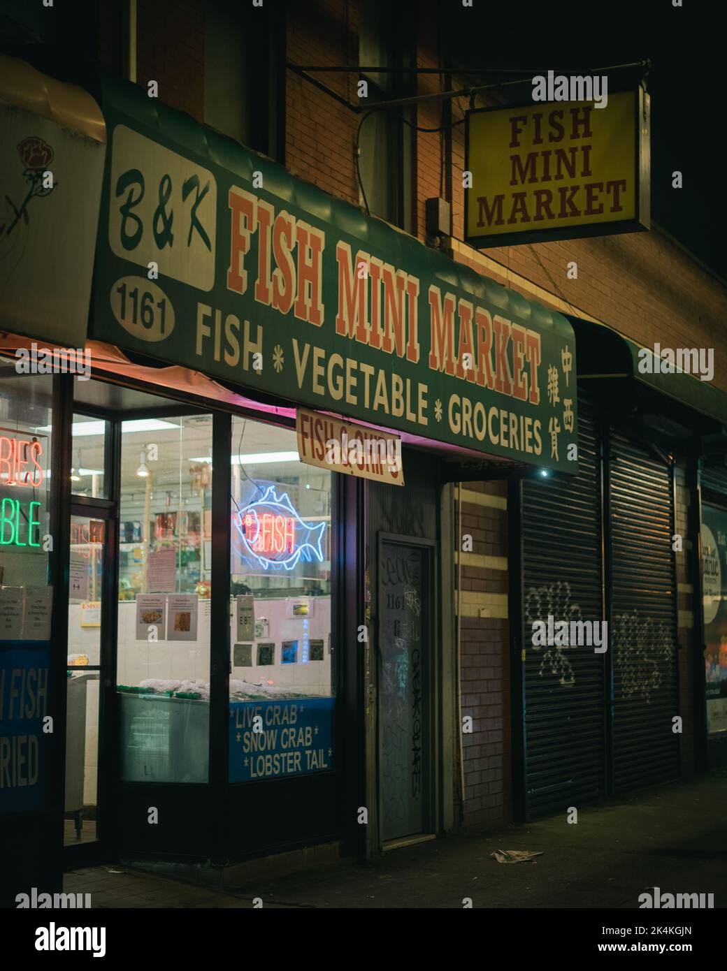 B&K Fish Mini Market signs at night, Brooklyn, New York Stock Photo - Alamy