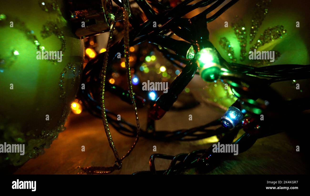 A sparkling transparent garland is carelessly wound into a heap ...