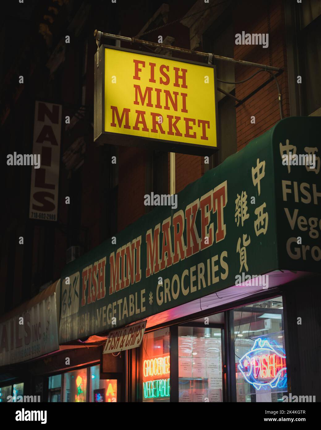 B&K Fish Mini Market signs at night, Brooklyn, New York Stock Photo - Alamy