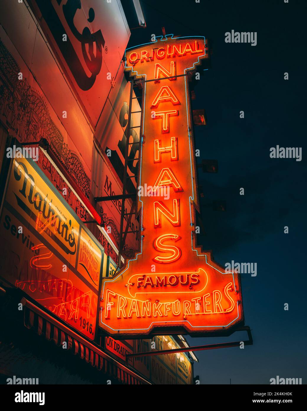Nathans Famous neon sign at night in Coney Island, Brooklyn, New York ...