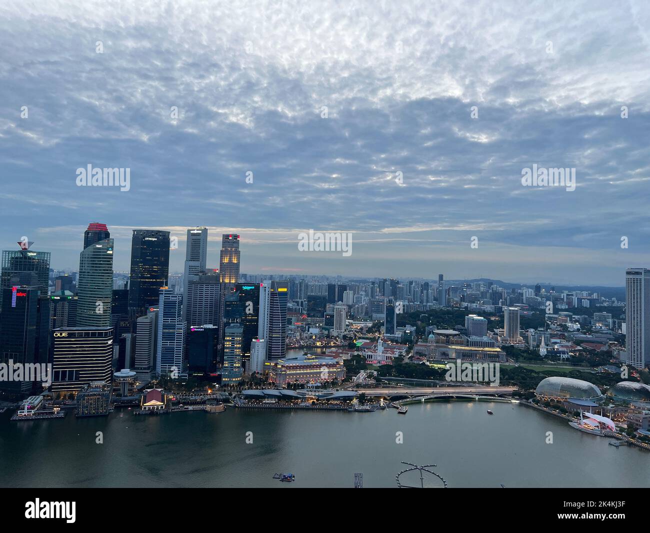 The waterside city buildings under the blue cloudy sky - urban ...