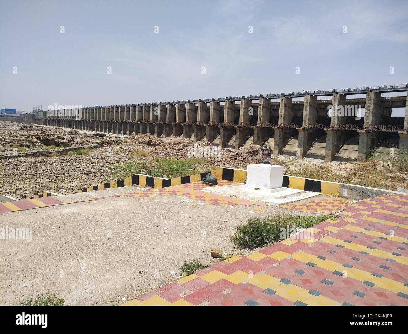 A dam without water in village Stock Photo - Alamy
