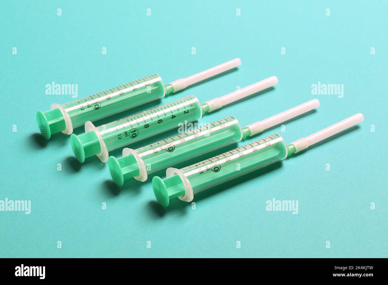 Top view of medical syringes on colorful background with copy space ...