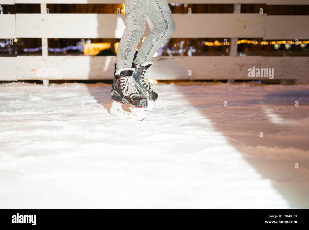 Male legs in ice skates Stock Photo - Alamy