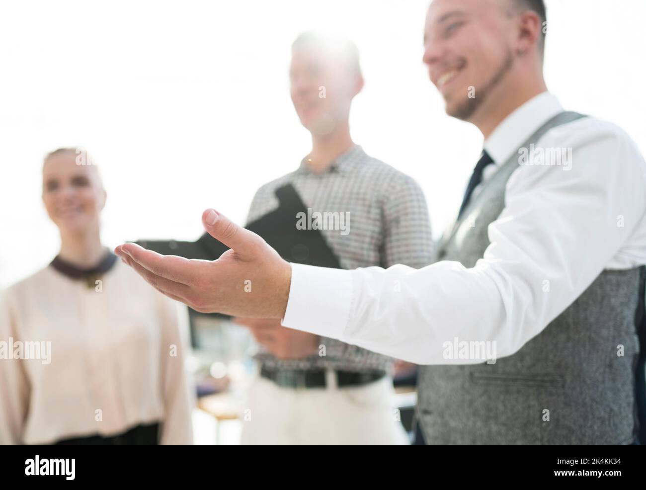 close up. group of young employees standing in the office Stock Photo ...