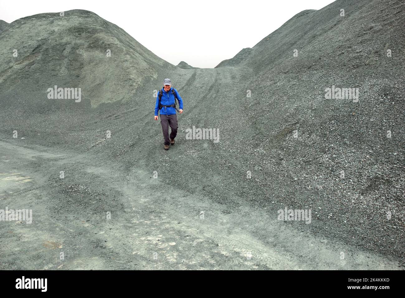 Lone Man Walking Past Spoil Heaps by the Honister Slate Quarry to the ...