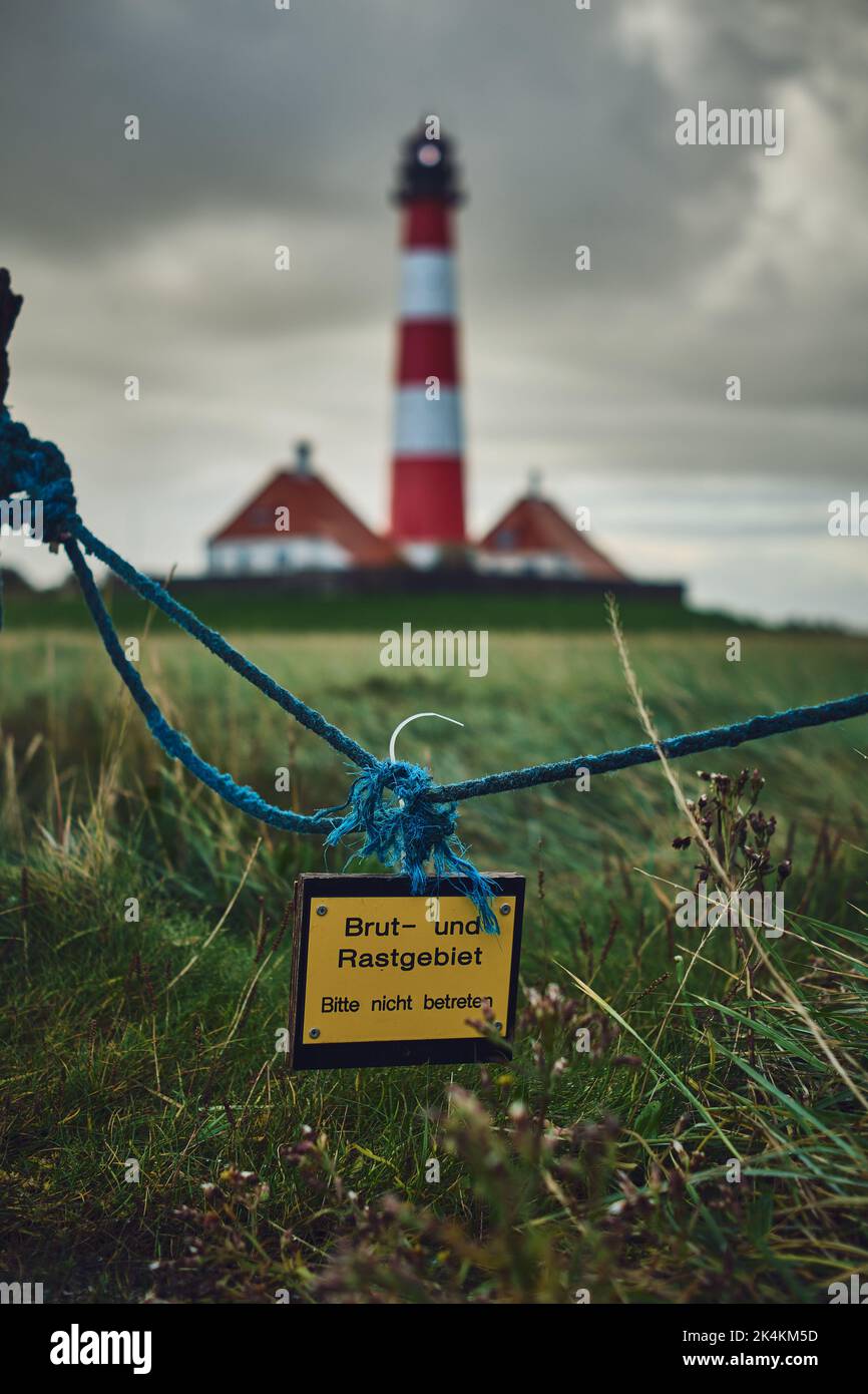 sign for breed and rest area at lighthouse westerheversand. High ...