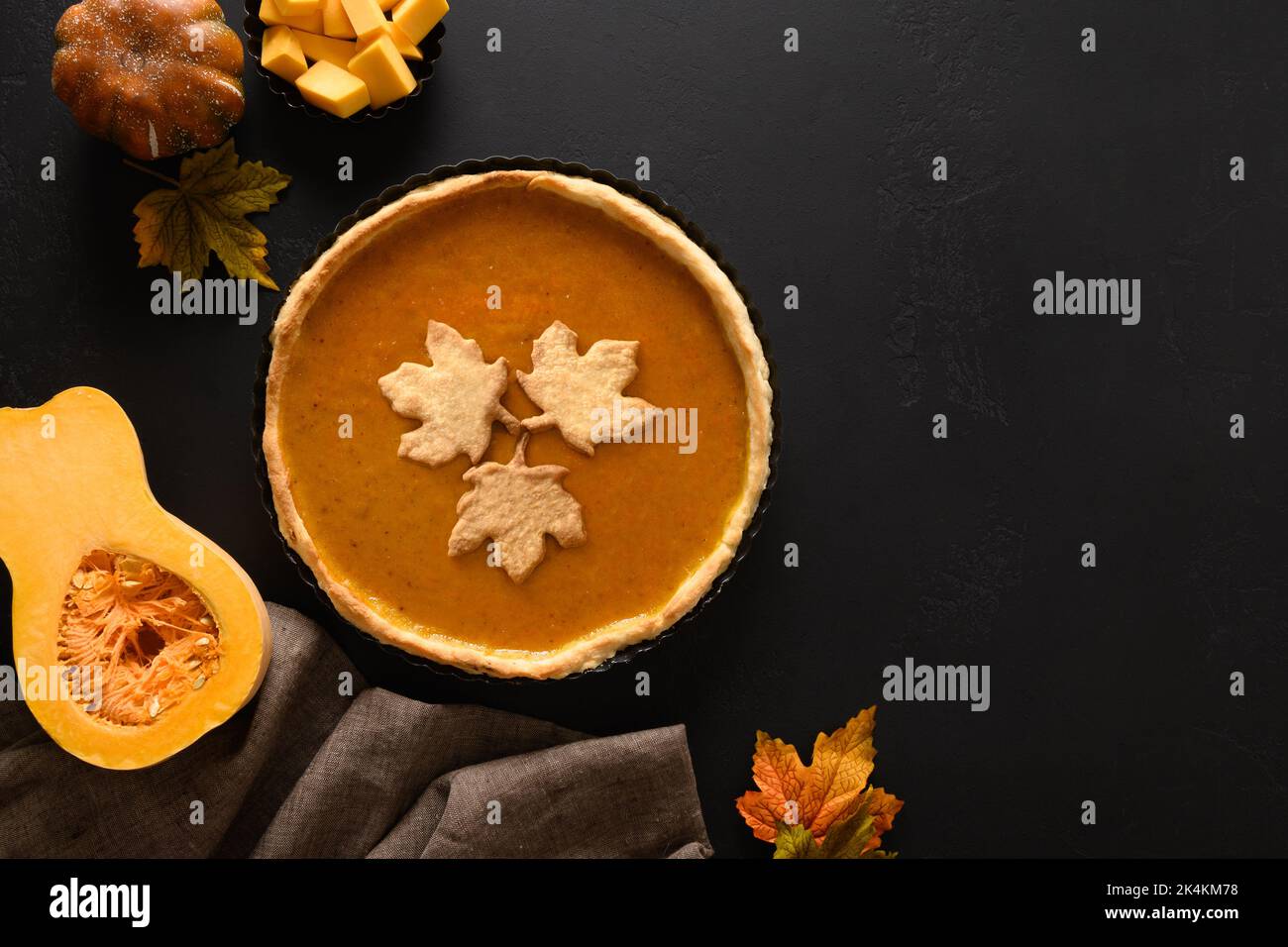Traditional American Pumpkin Pie decorated cookies on black background ...