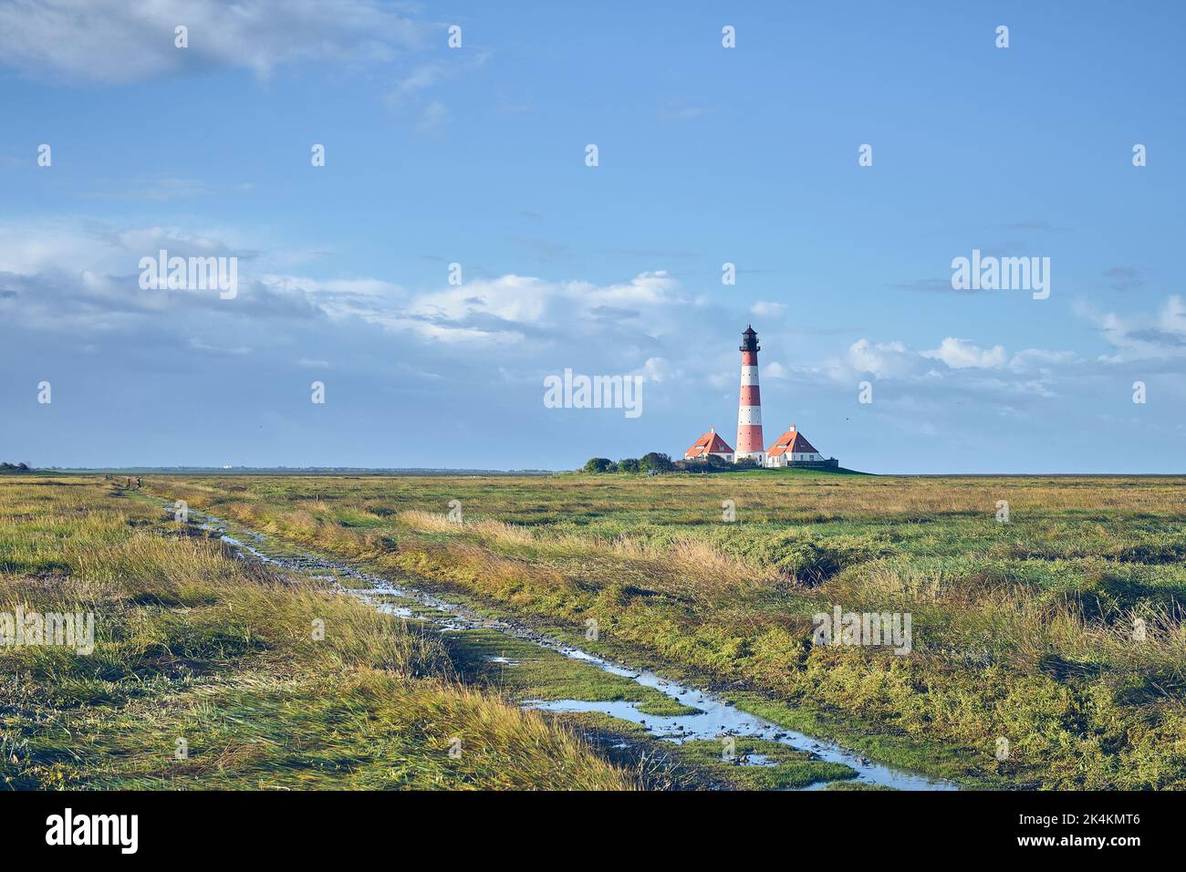Lighthouse Westerheversand in Germany. High quality photo Stock Photo ...