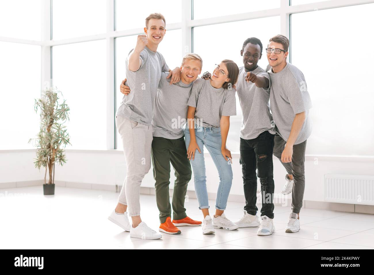 group of happy ground people standing together Stock Photo - Alamy