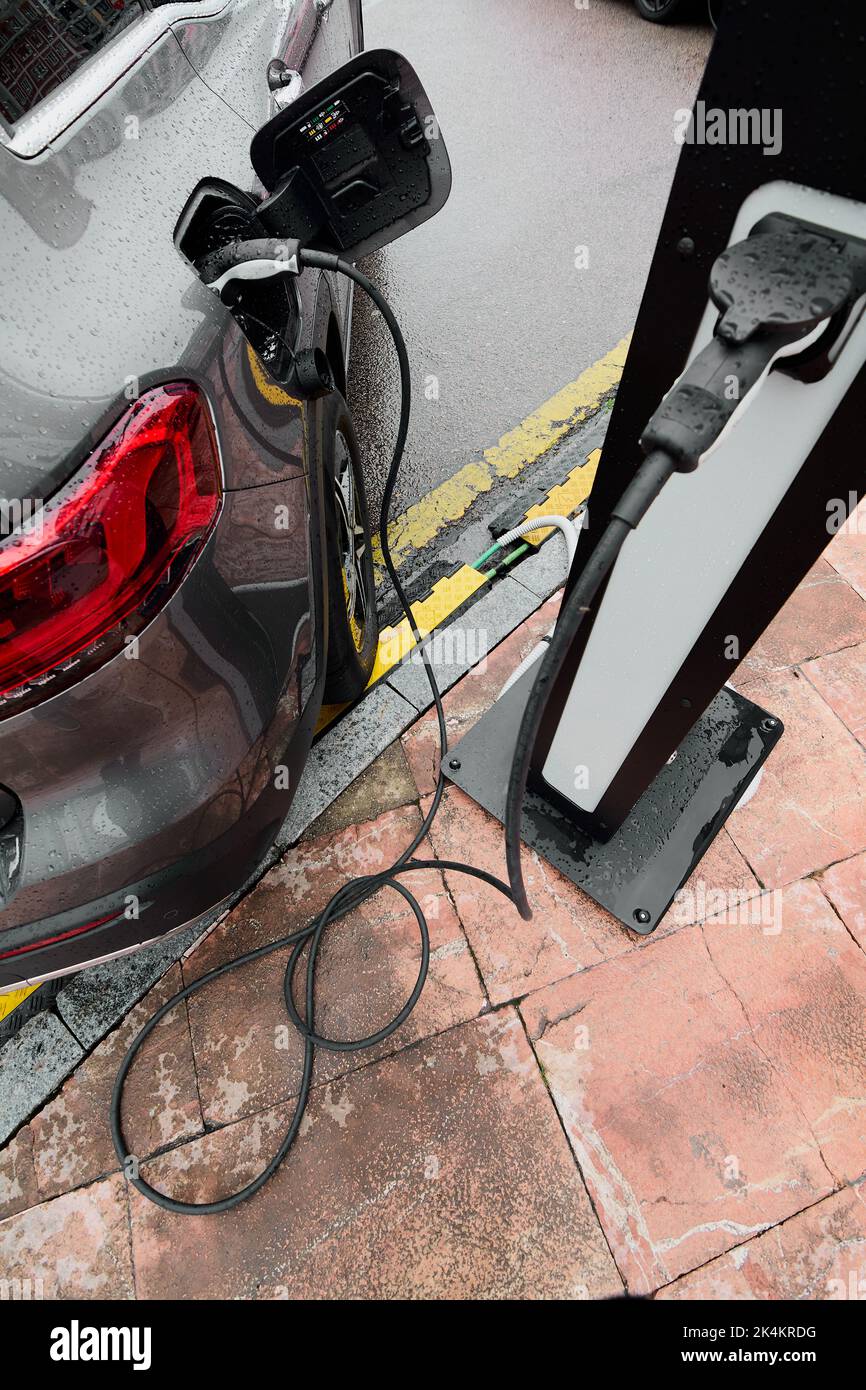 Car connected to electricity supply hi-res stock photography and images ...