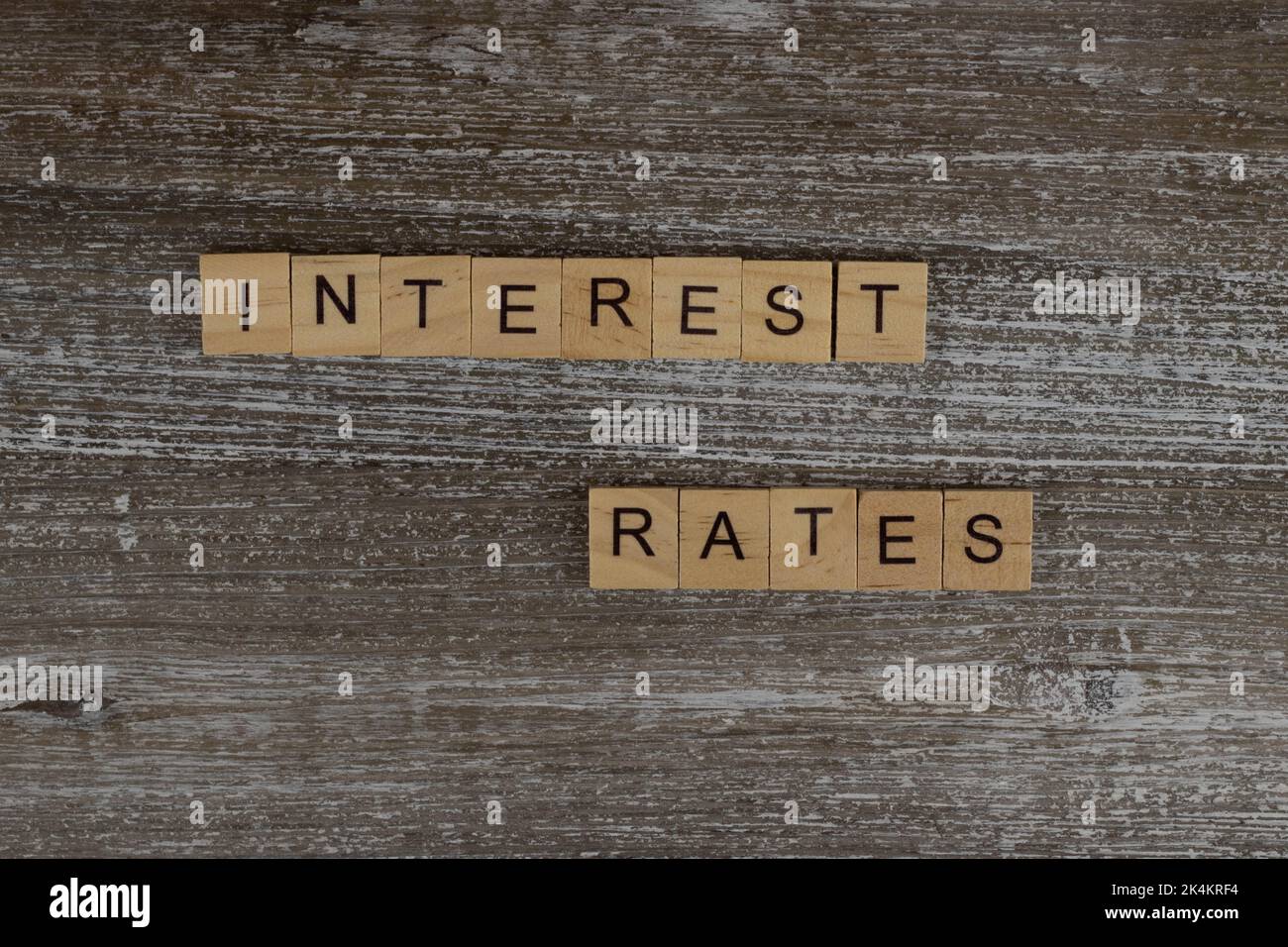Interest rates spelled out in wooden letters, interest wooden words ...