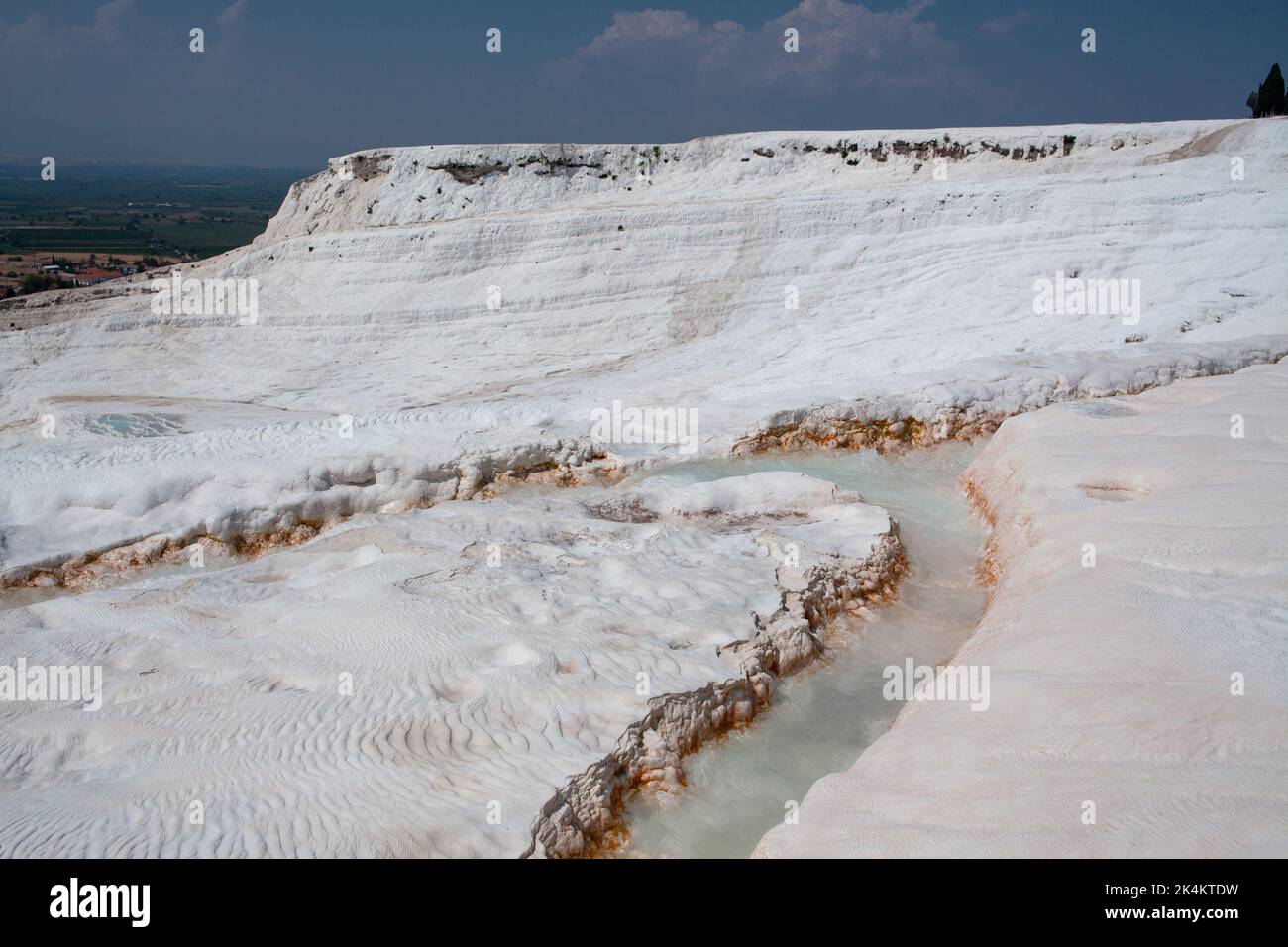 Pamukkale landsape. White terraces with natural travertines in ...