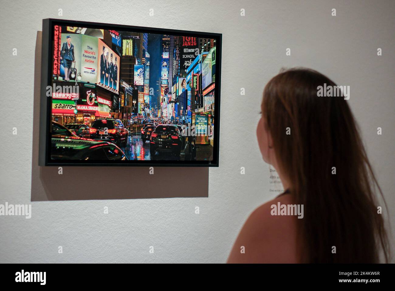 A visitor observes a picture of the author Don Jacot during the ...