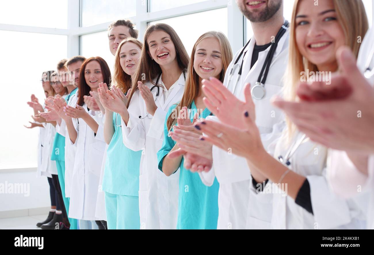 top view. a group of smiling doctors pointing at you Stock Photo - Alamy